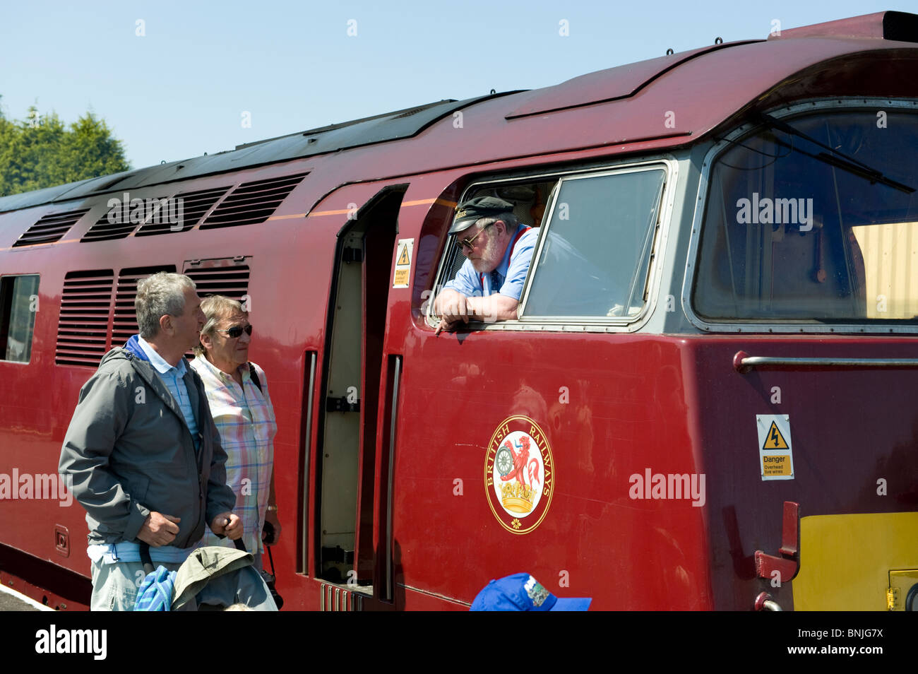 Visitors chat to the driver of the preserved 'Western' class diesel ...