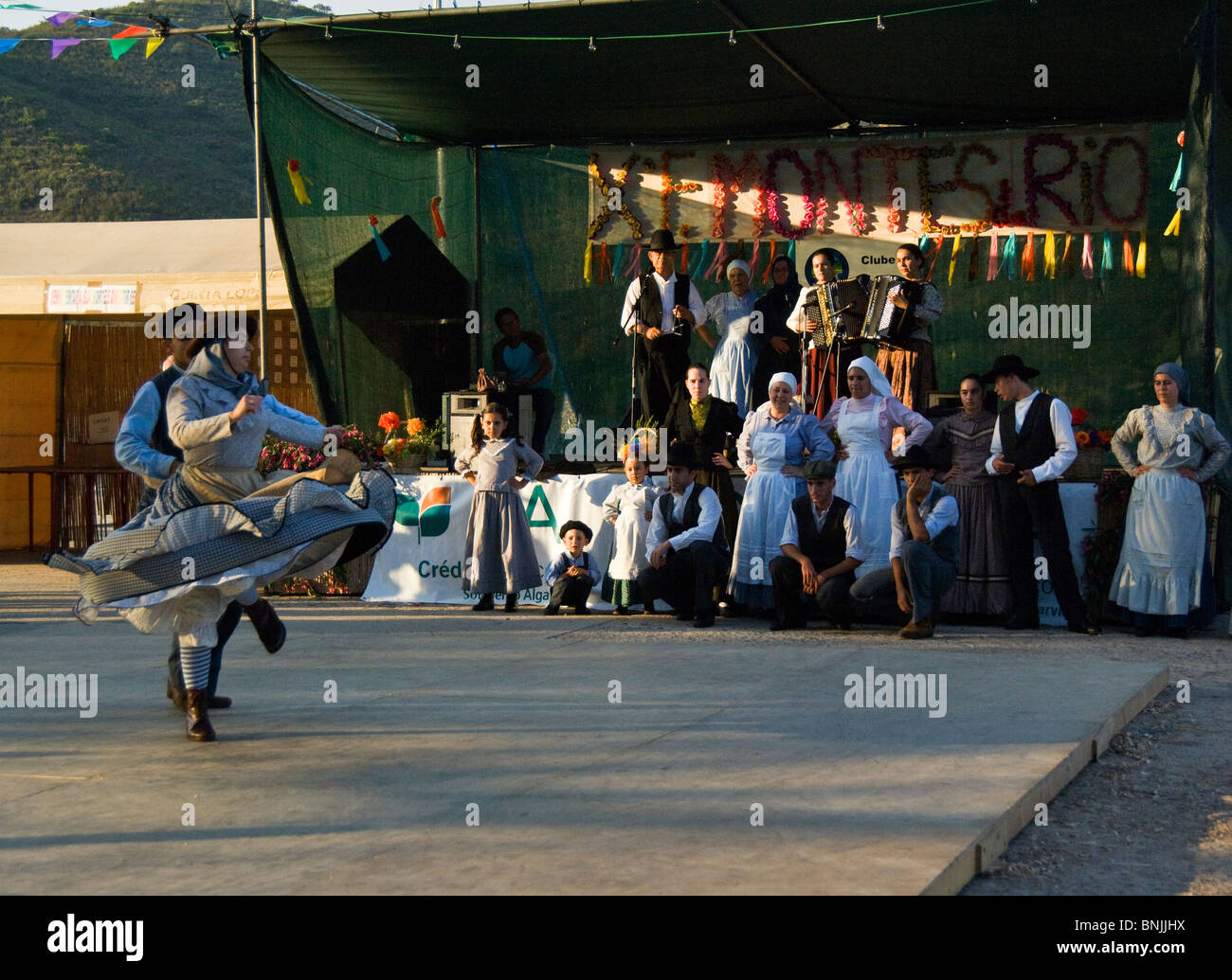 Traditional Portuguese folk dancing taking place during a local fiesta ...