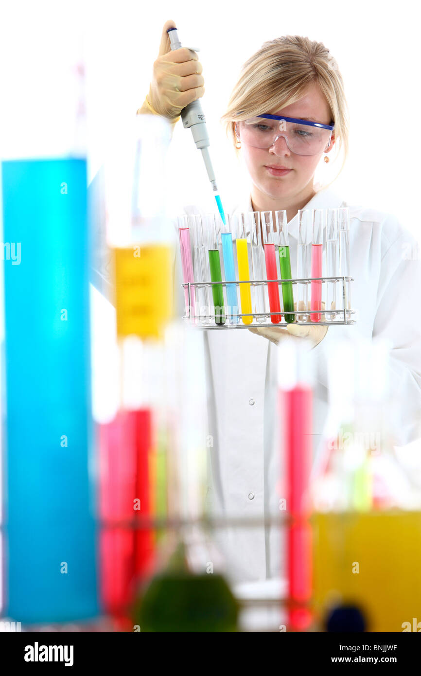 Laboratory assistant working in a chemical laboratory. Working with ...