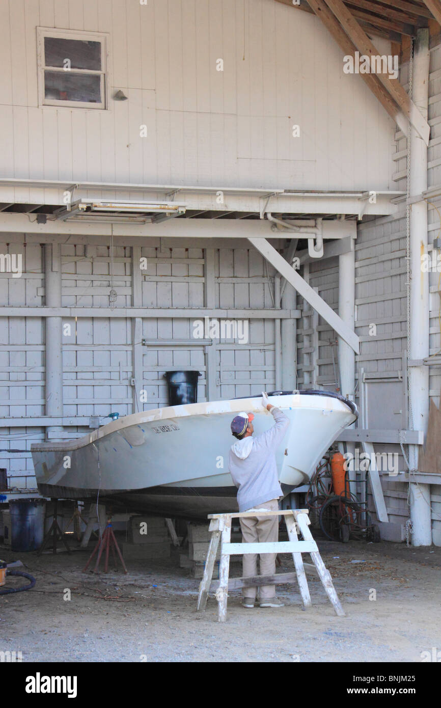 Man works on boat hi-res stock photography and images - Alamy