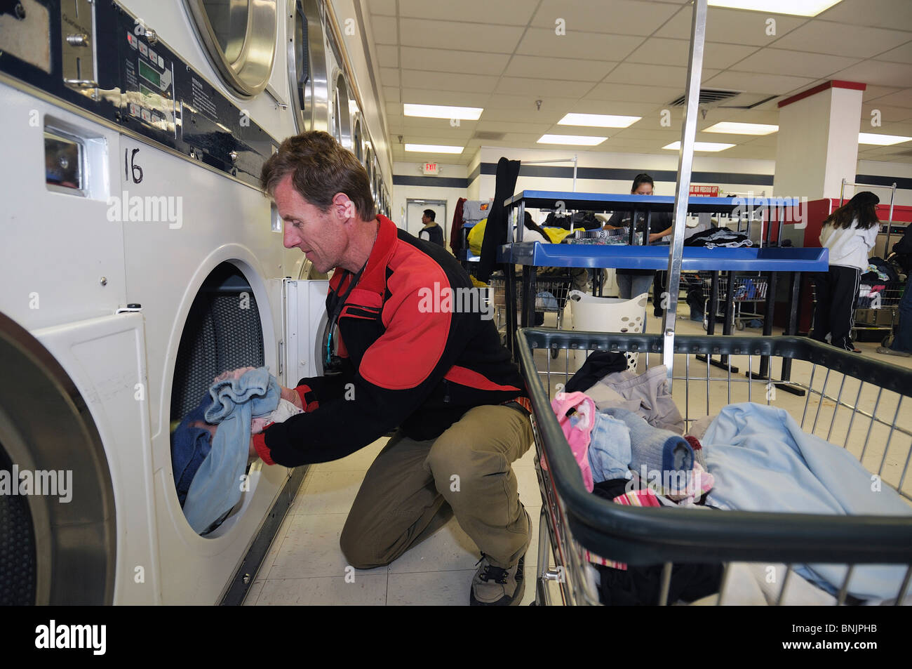 man person washing clothes doing laundry Chinle Arizona USA America ...