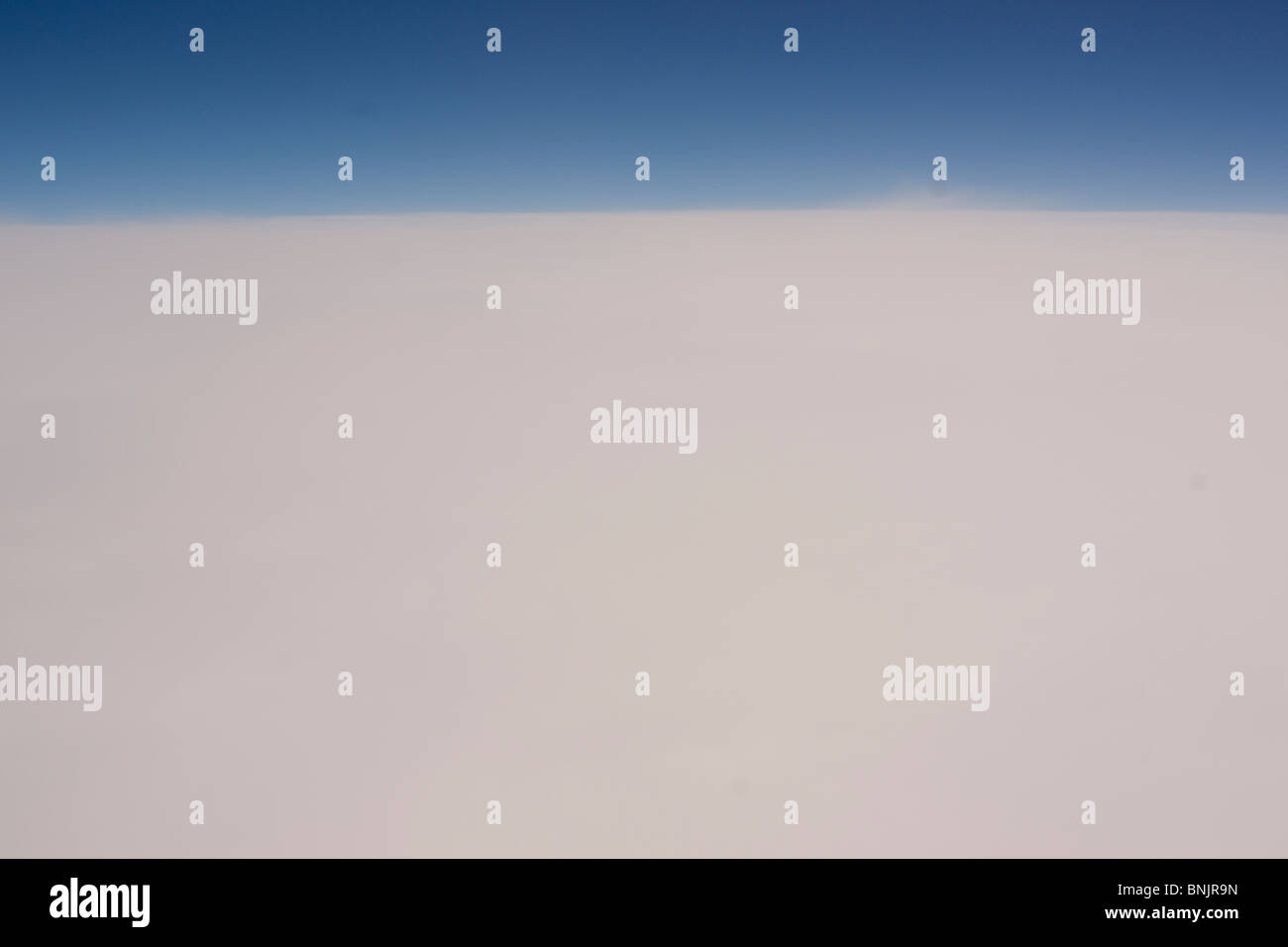 Clouds outside jet window Stock Photo - Alamy