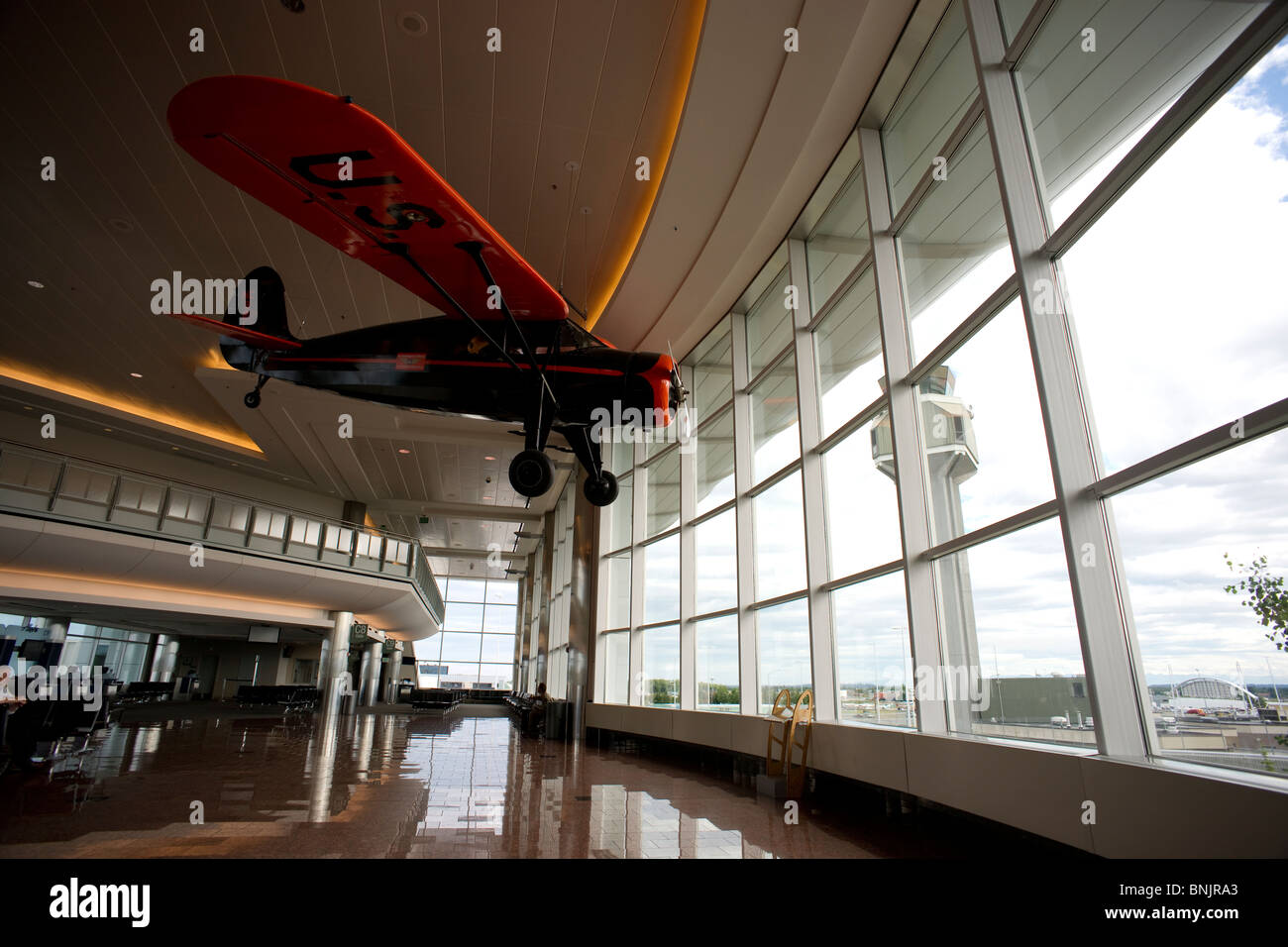 Prop Plane hanging from the ceiling inside the Anchorage International ...