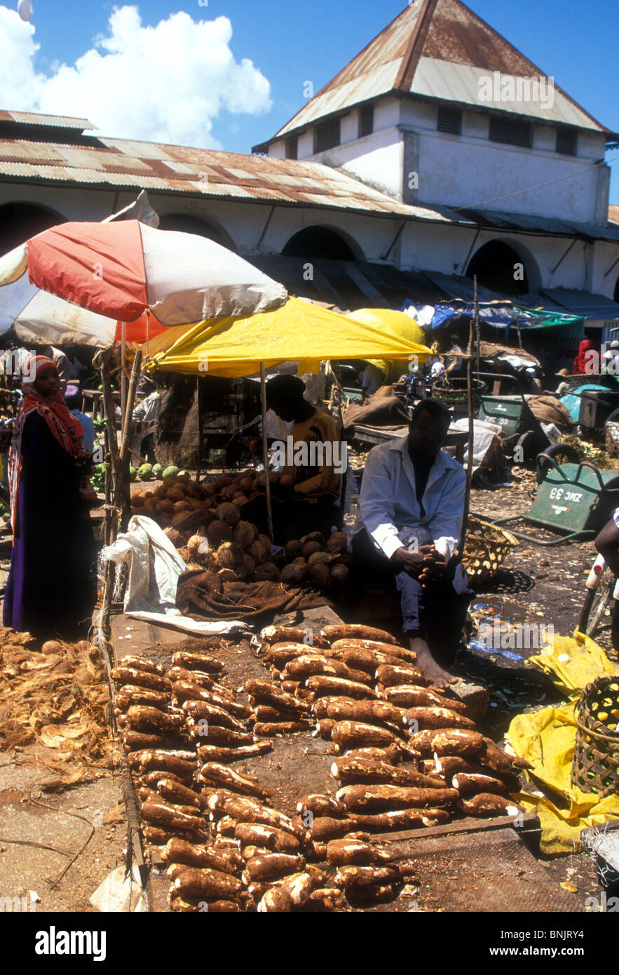 Stone Town market Zanzibar with cassava root on sale Stock Photo - Alamy