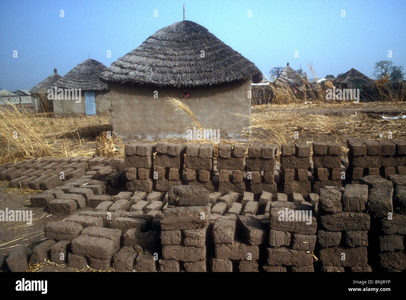 House building using mud bricks in West Africa Stock Photo - Alamy
