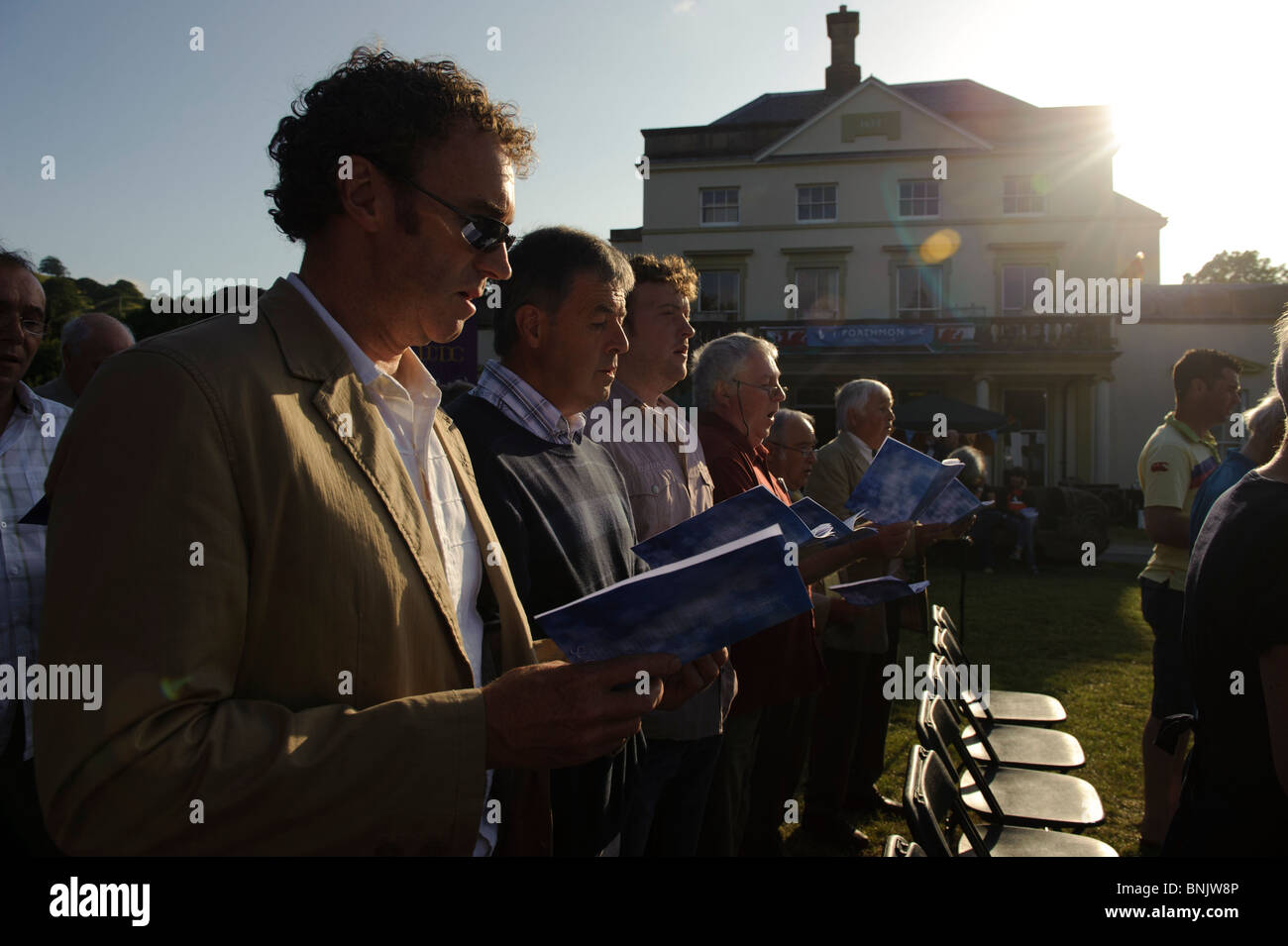 Men singing during the broadcasting of the welsh TV hymn singing ...