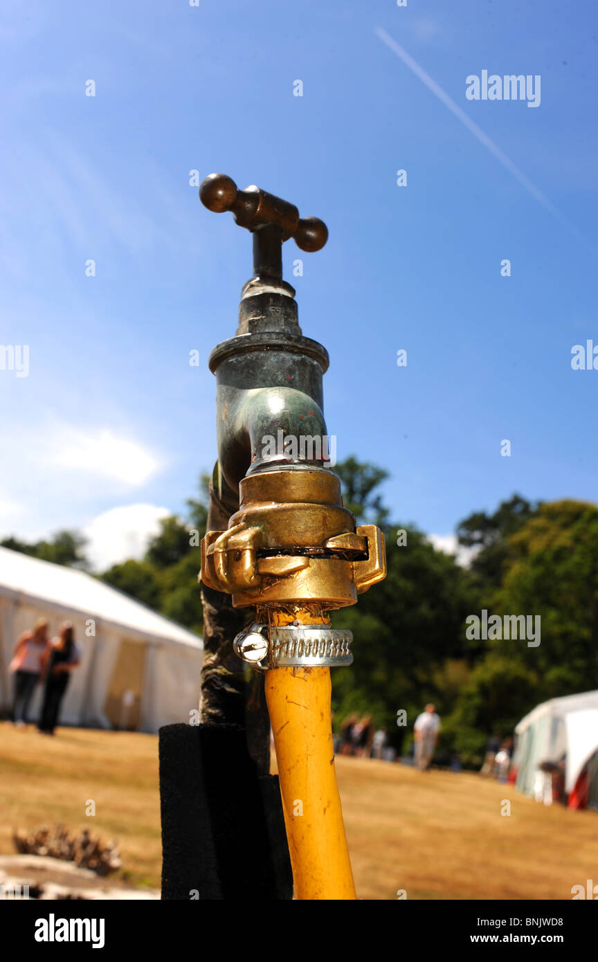 Hosepipe and tap in drought conditions UK Stock Photo - Alamy