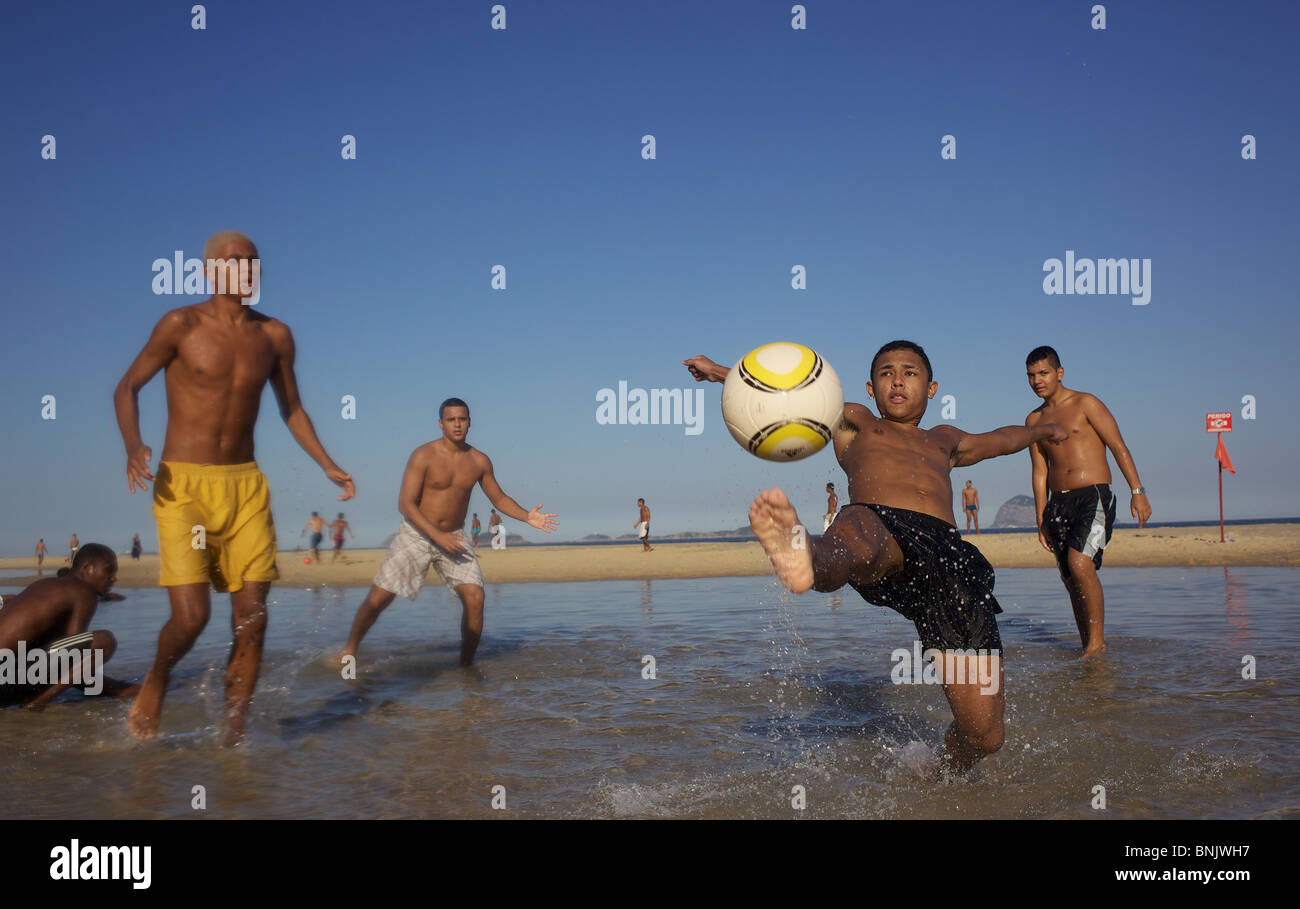 Football on rio beaches ipanema beach play hi-res stock photography and ...
