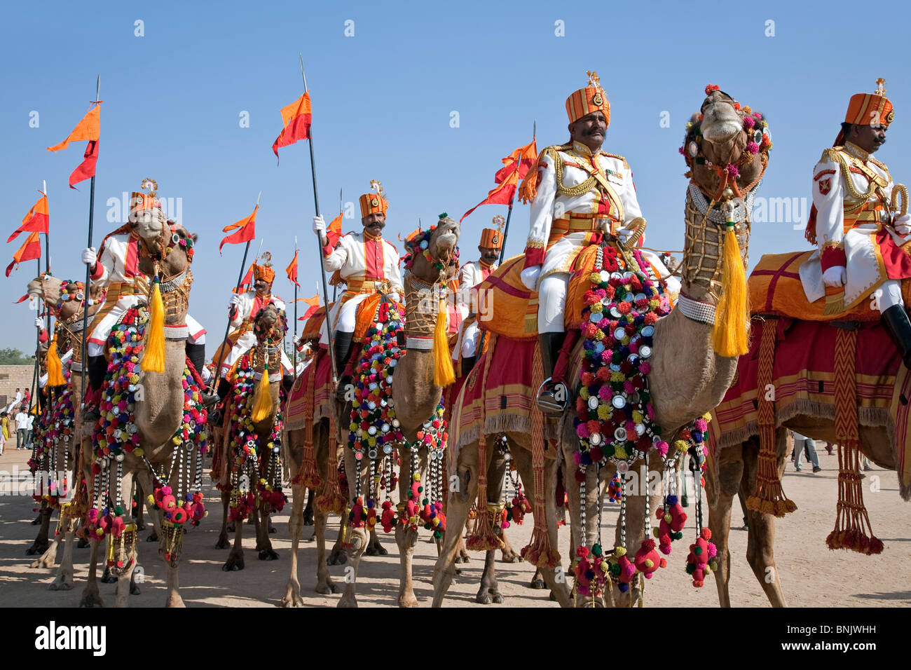 Indian soldiers riding camels. Jaisalmer Festival. Rajasthan. India ...