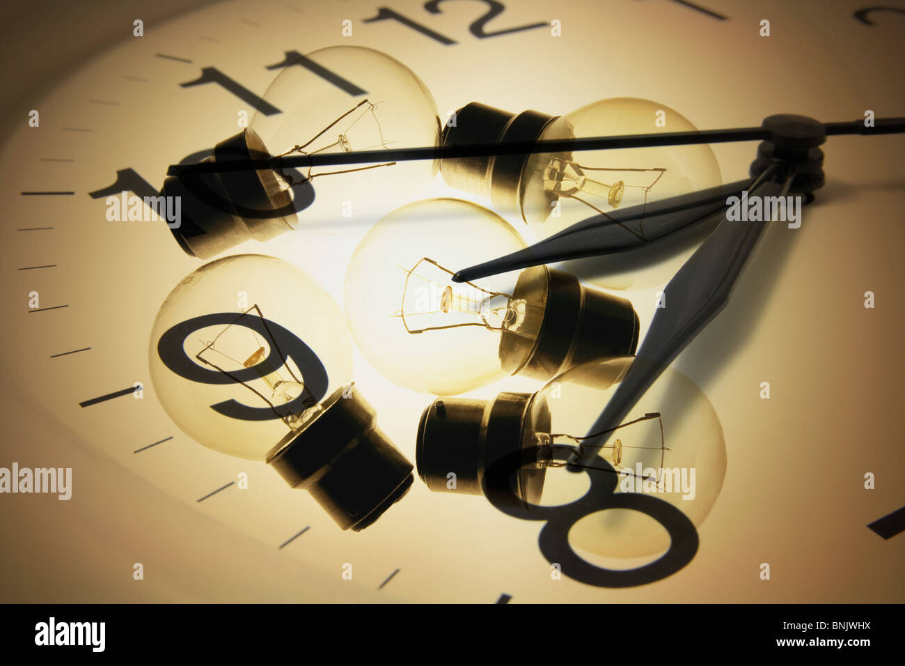 Clock and Lightbulbs Stock Photo - Alamy