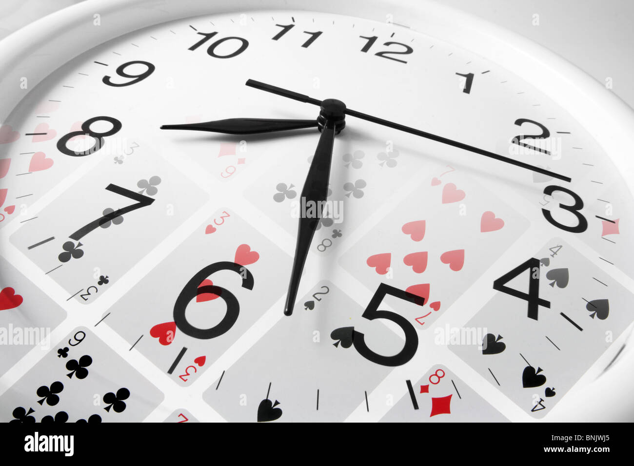 Clock and Playing Cards Stock Photo - Alamy