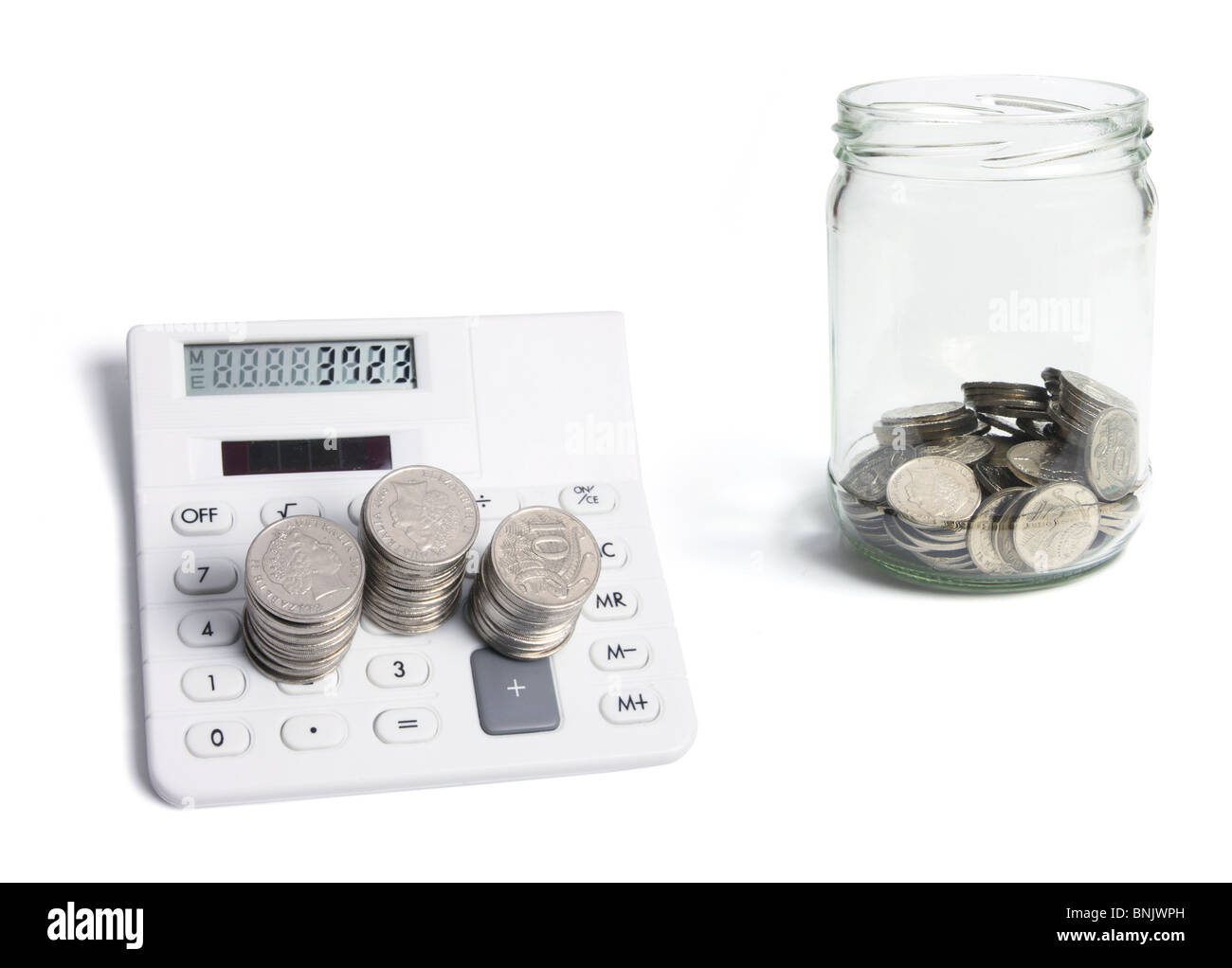 Calculator and Coins Stock Photo - Alamy