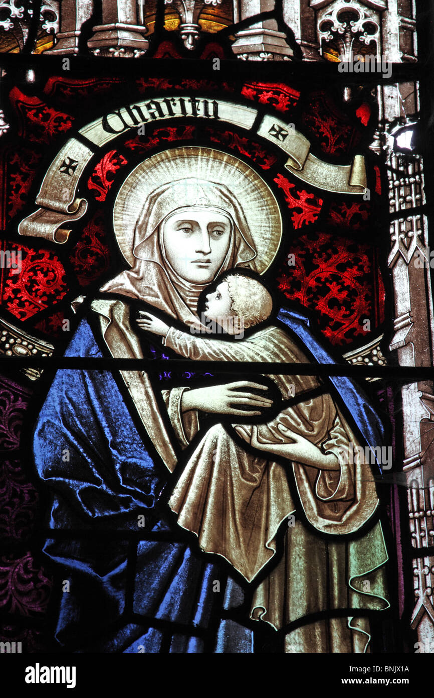 A stained glass window depicting Charity, Parish Church of St James the ...