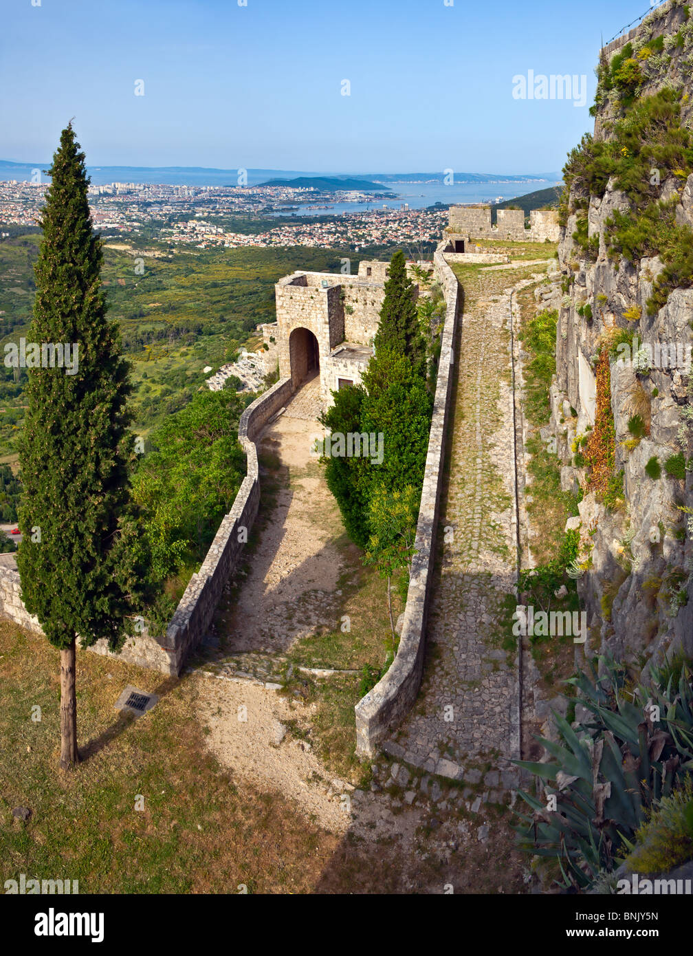 Klis - Medieval fortress in Croatia. Split in the back, Dalmatia Stock ...
