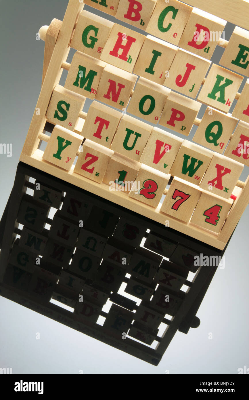 Alphabet Blocks on Wooden Rack Stock Photo - Alamy