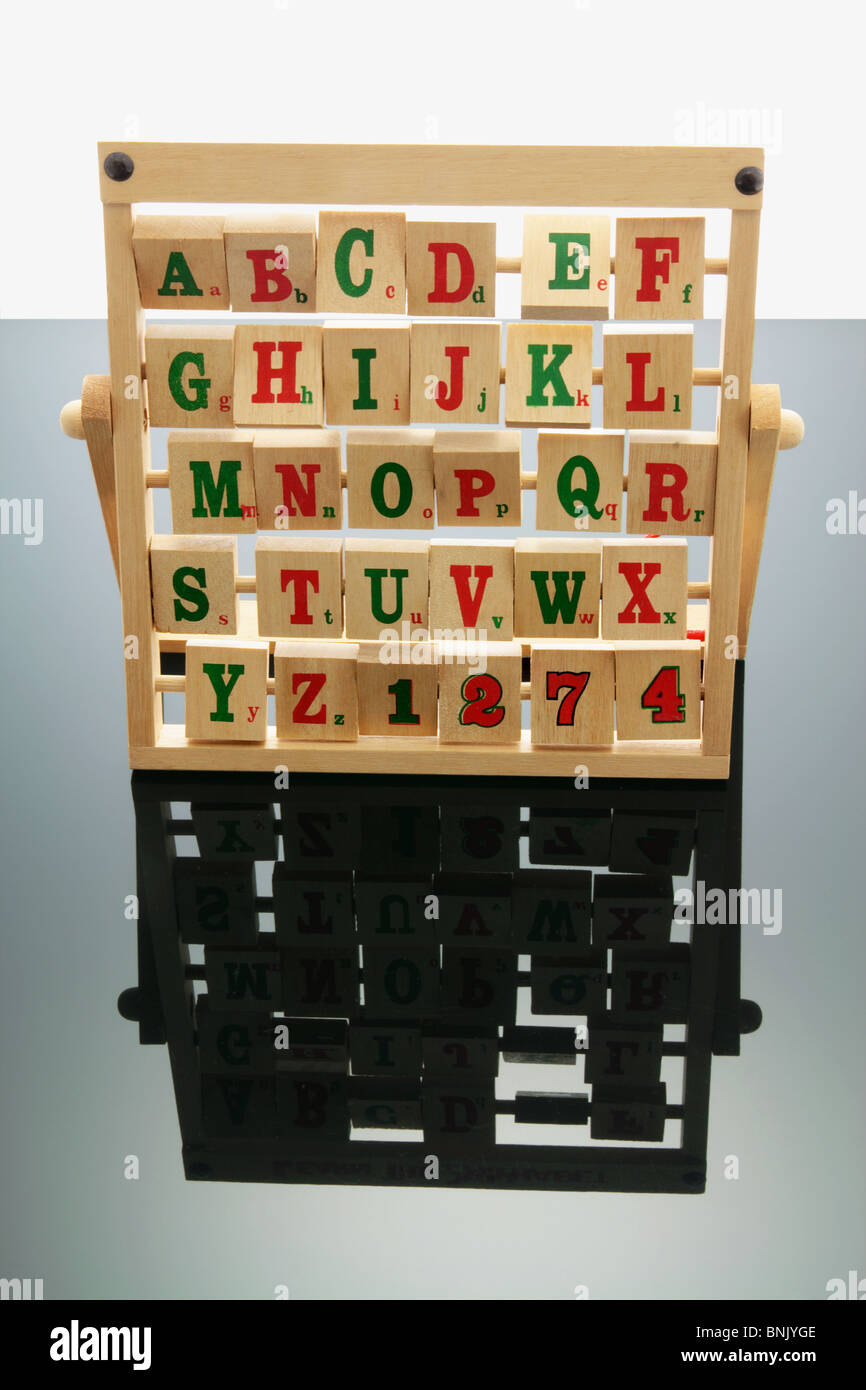 Alphabet Blocks in Wooden Rack Stock Photo - Alamy