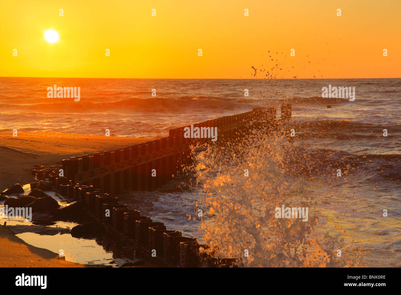 Beach Ocean Wave Sunrise Crashing High Resolution Stock Photography and ...