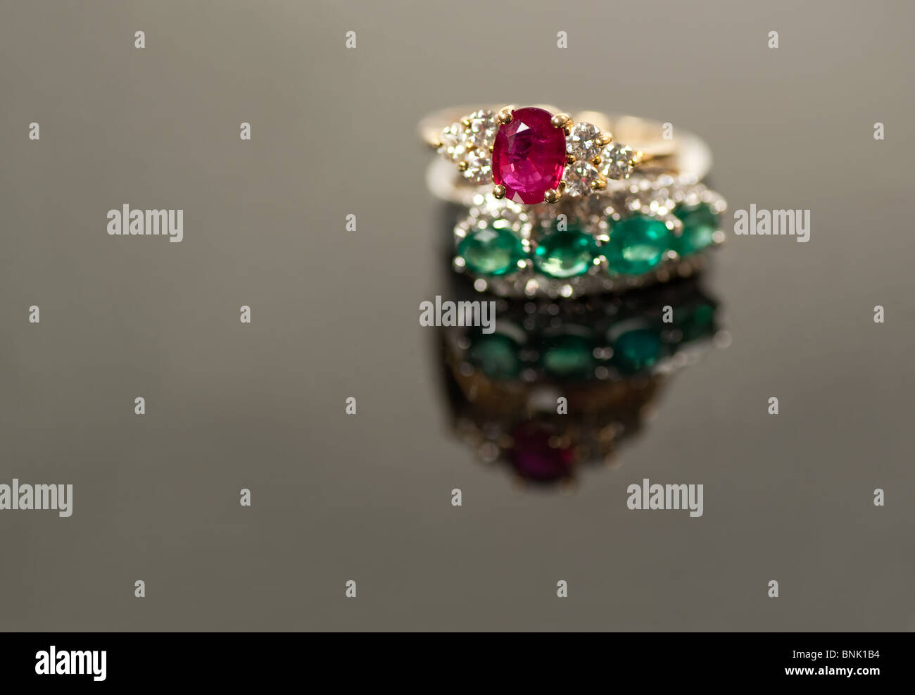 ruby and emerald rings in diamond settings Stock Photo - Alamy