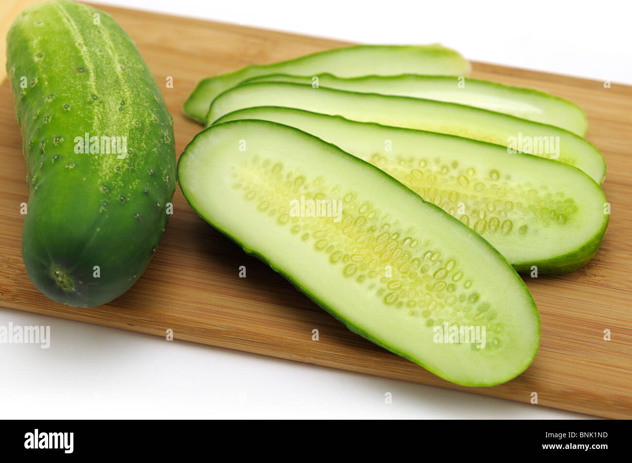 Whole and Sliced Cucumbers Stock Photo - Alamy