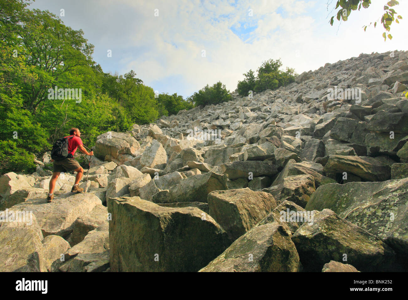 Hiker at the Devils Marbleyard on the Belfast Trail in James River Face ...