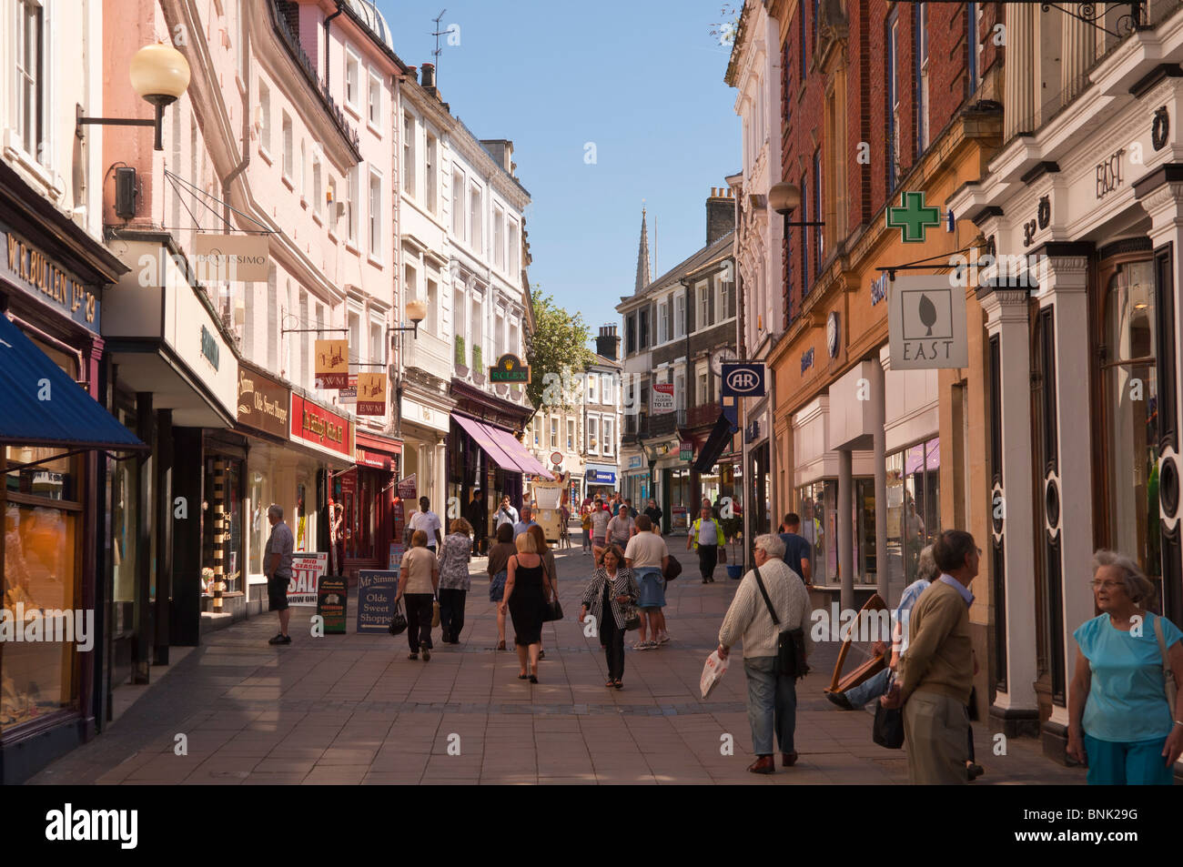 The city centre in summer with shoppers in Norwich , Norfolk , England ...