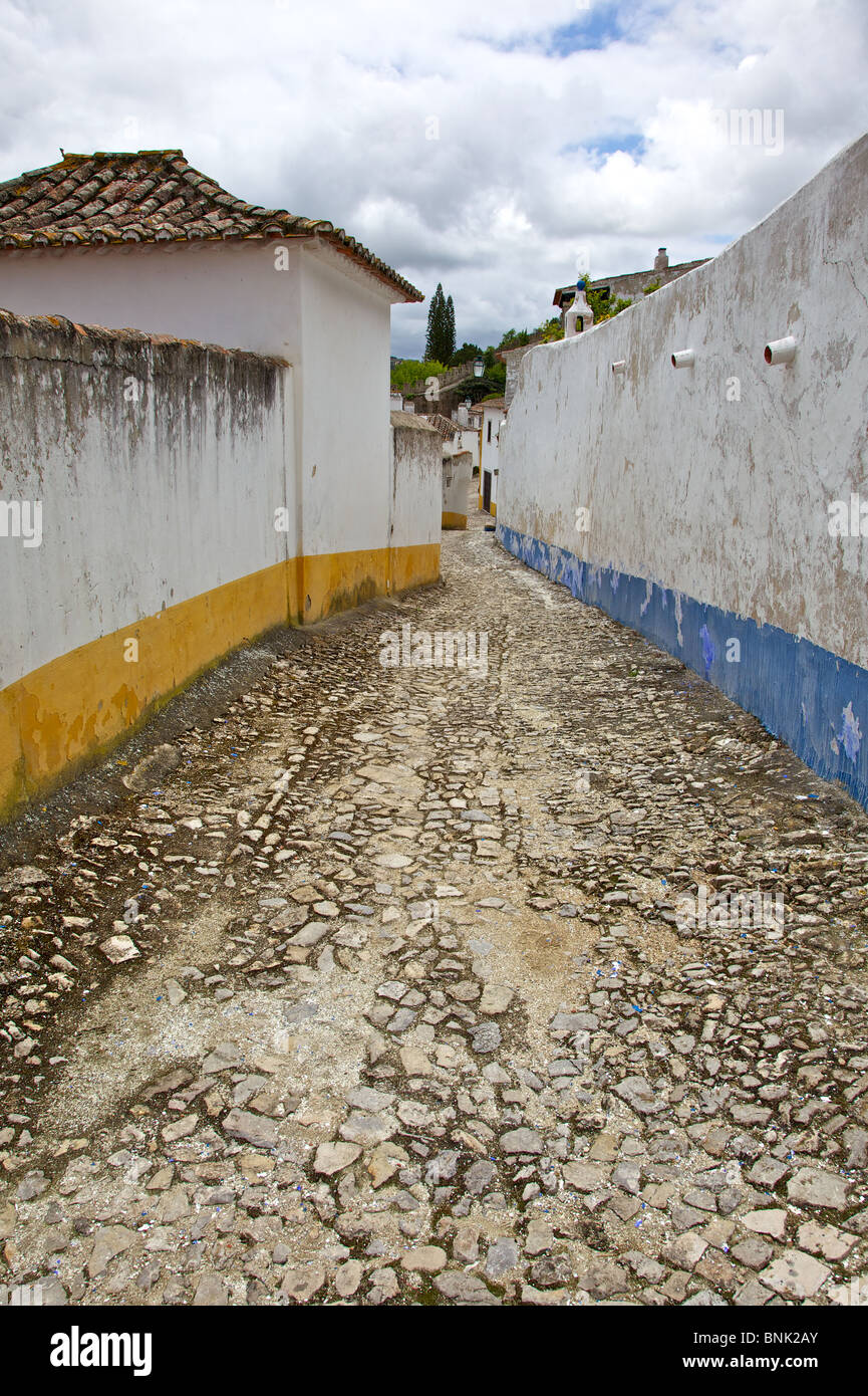 Medieval cobblestone street fortified village hi-res stock photography ...