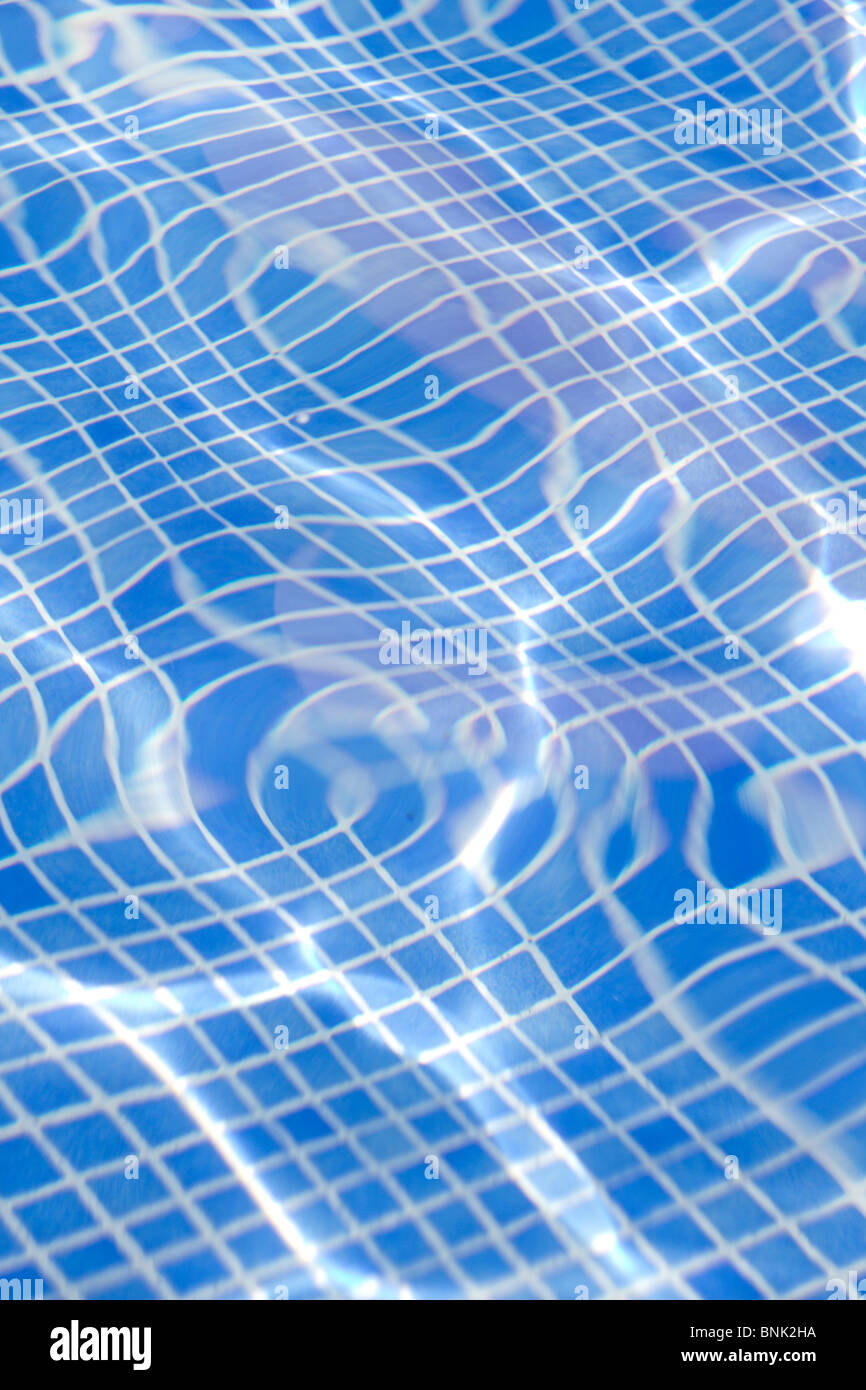 Waves on a surface of water in pool Stock Photo - Alamy