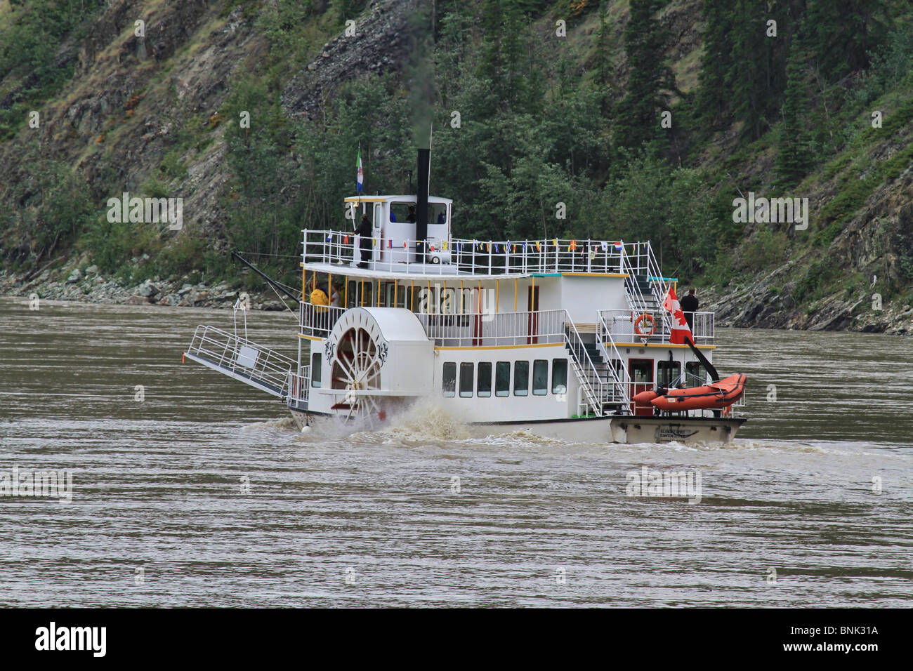 Boat, steam paddle wheel on Yukon River in Dawson, Canada. Historic ...