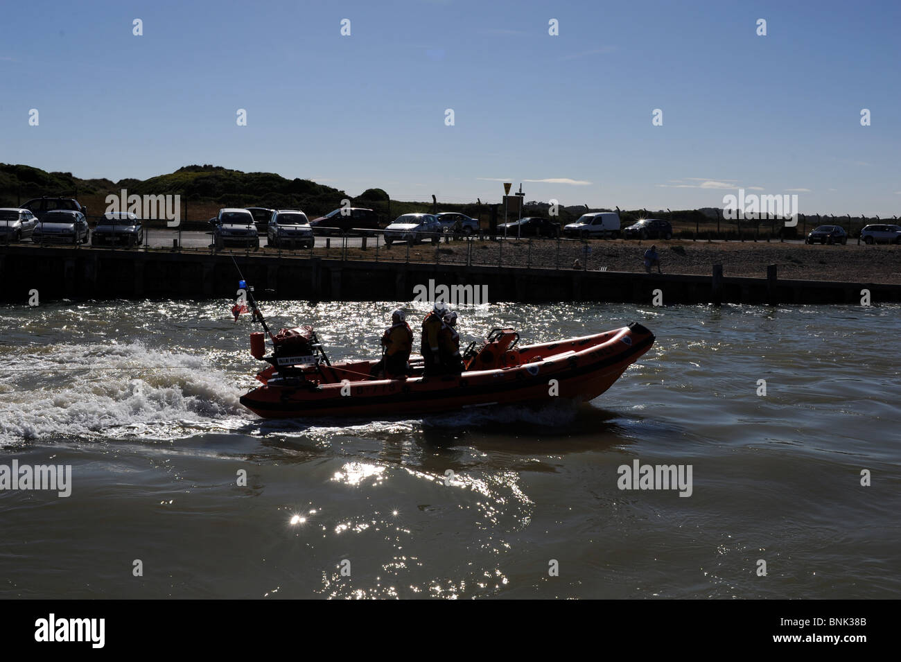 Littlehampton lifeboat Blue Peter 1 enters the harbour entrance on ...