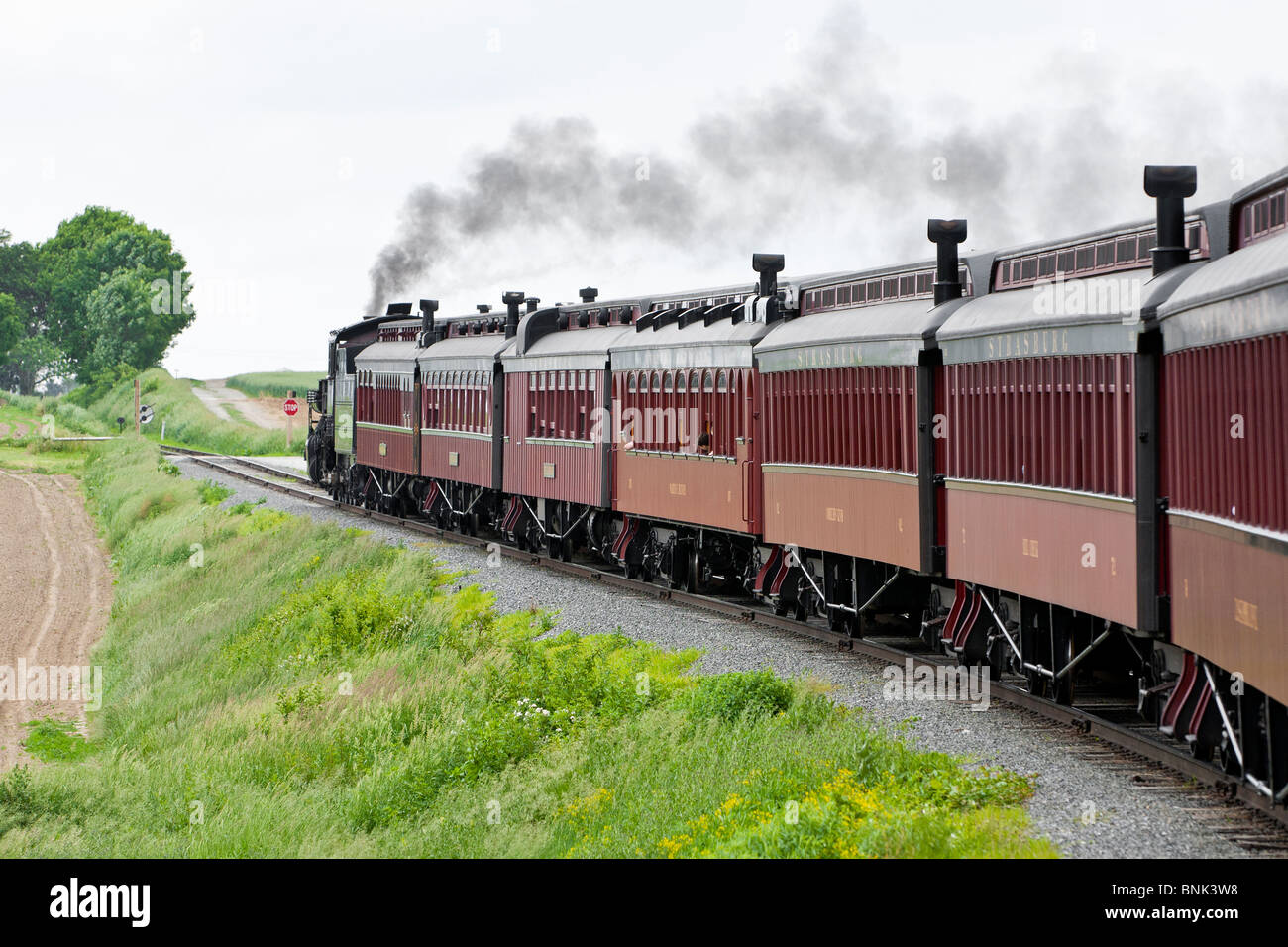 A Steam Locomotive Train traveling across the horizon Stock Photo - Alamy