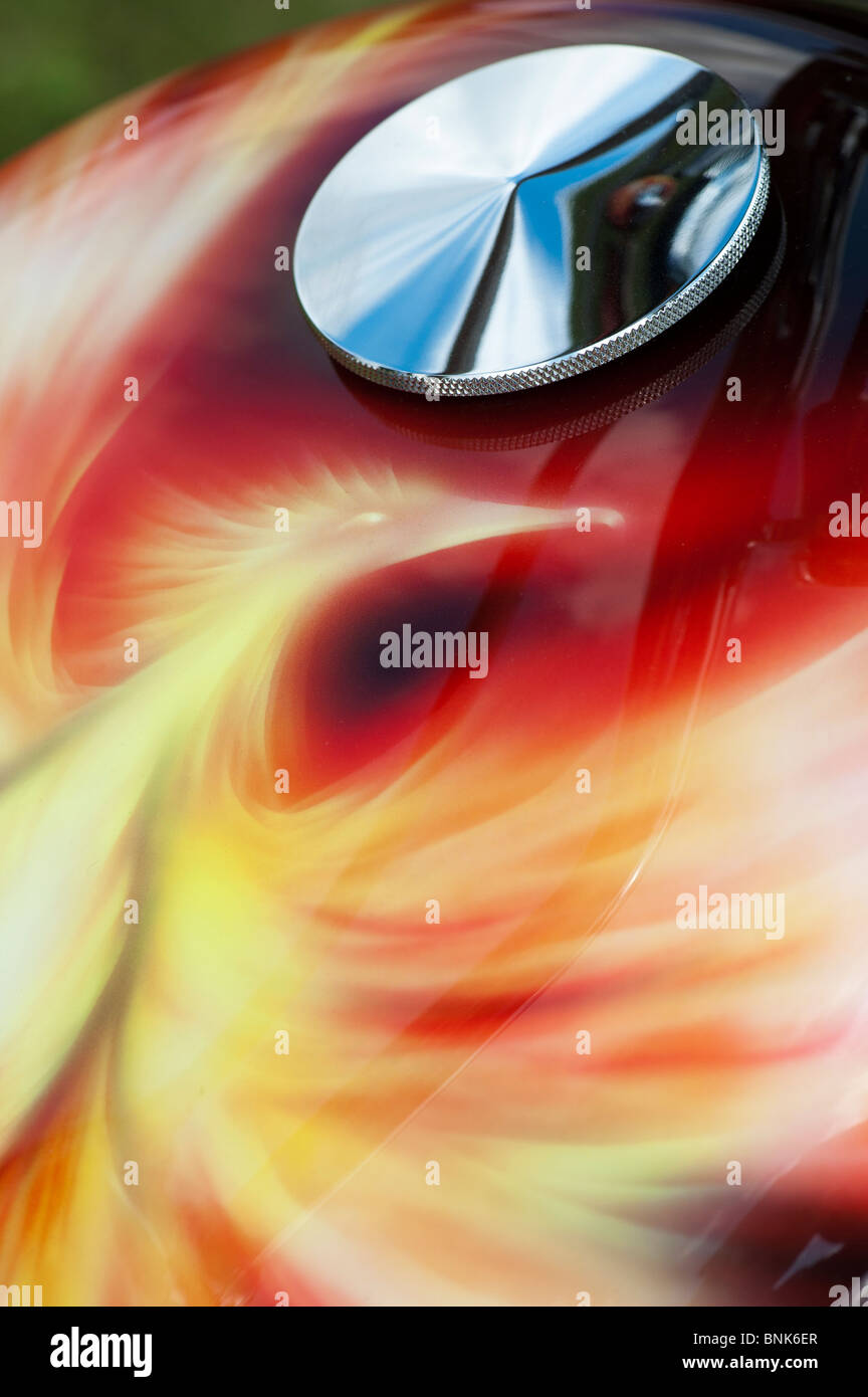 Airbrushed fantasy artwork of a phoenix painted on a Custom chopper ...