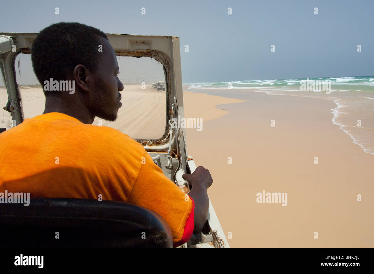 Africa, Senegal, Dakar. Exploring the sand dunes and beach area around ...
