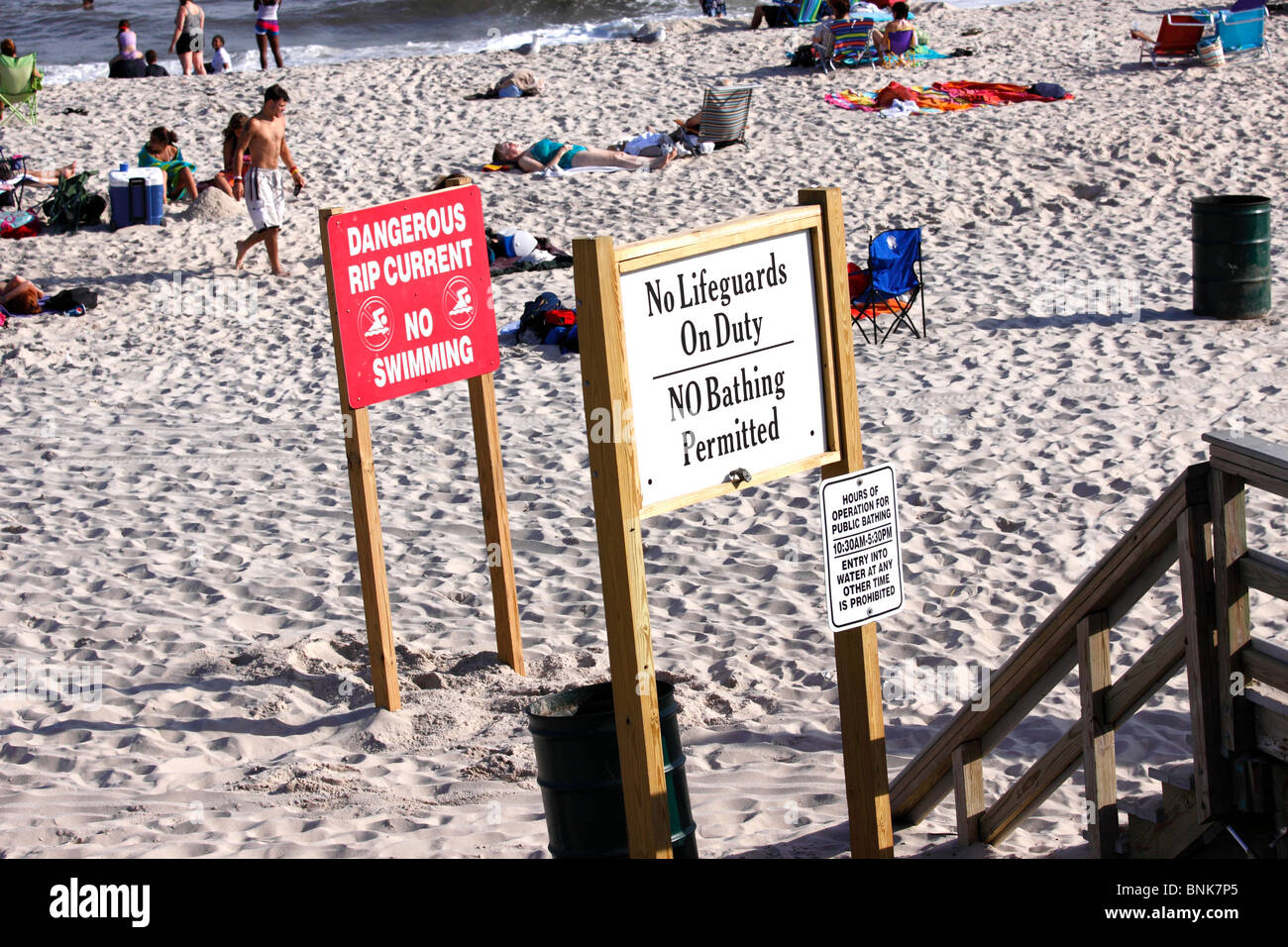 Signs warning people that ocean conditions are too dangerous for ...