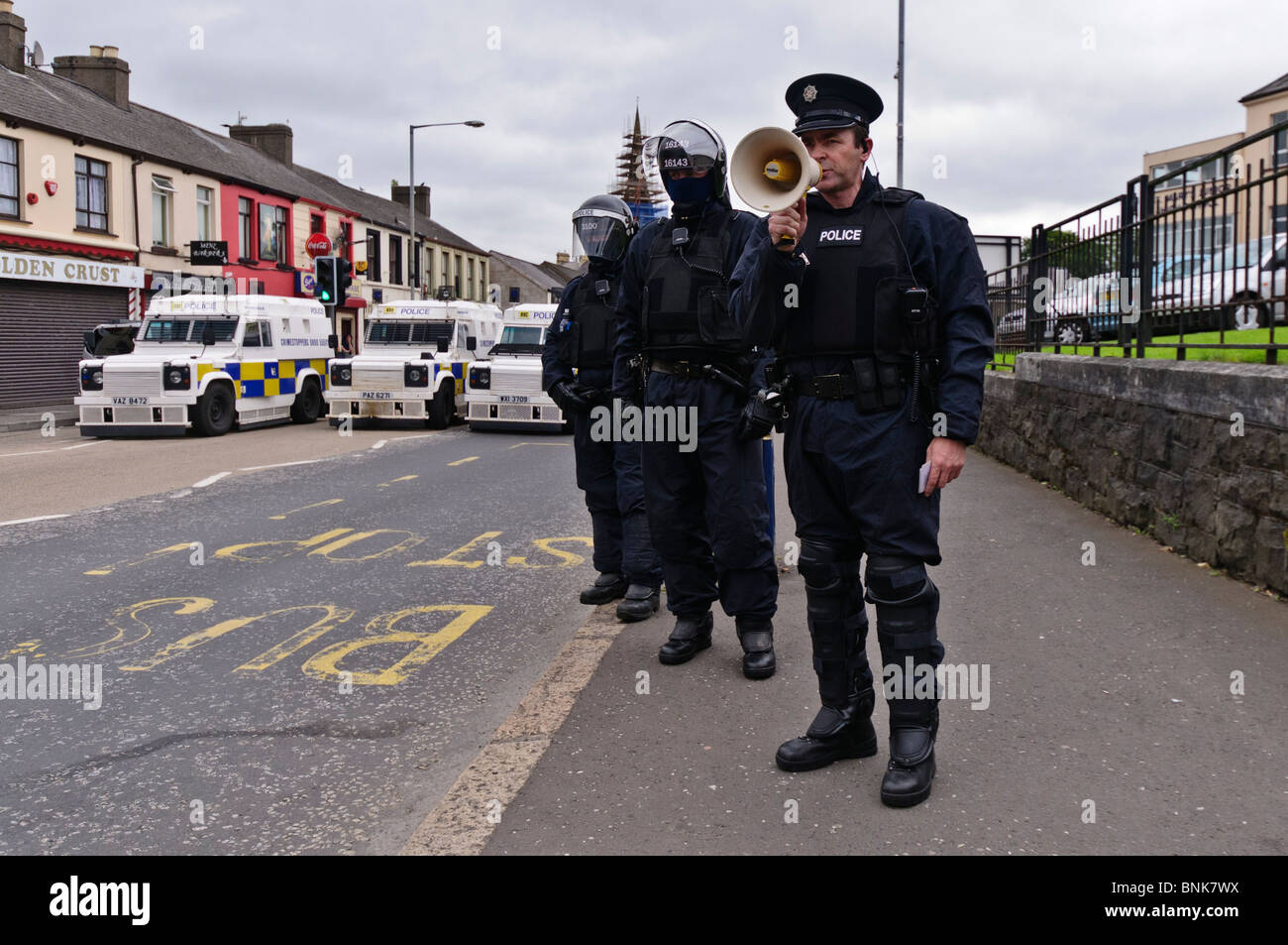 Police officer with megaphone hi-res stock photography and images - Alamy