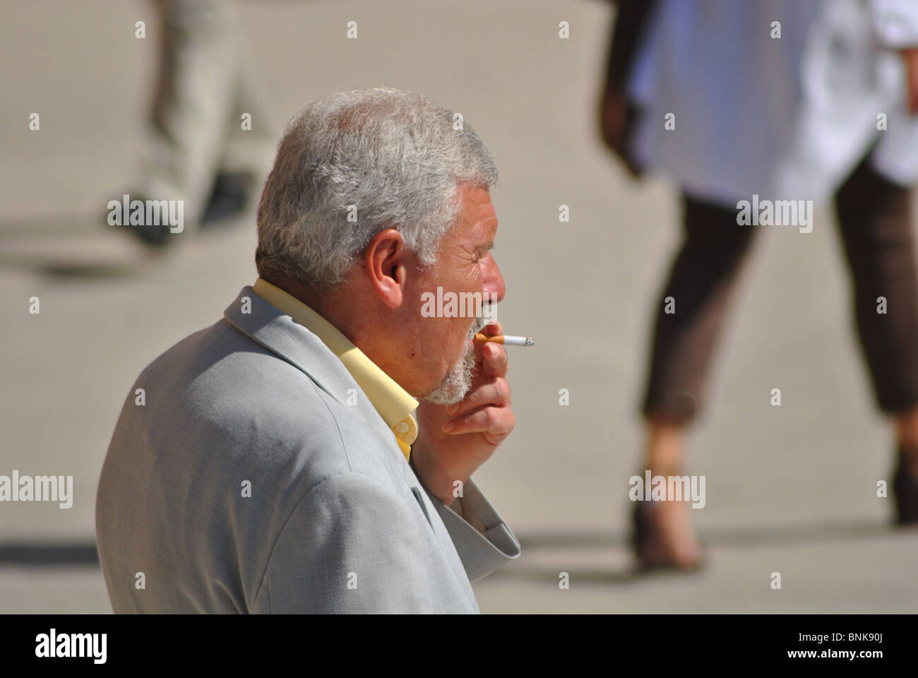 Italian businessman smoking cigarette, Venice, italy Stock Photo - Alamy