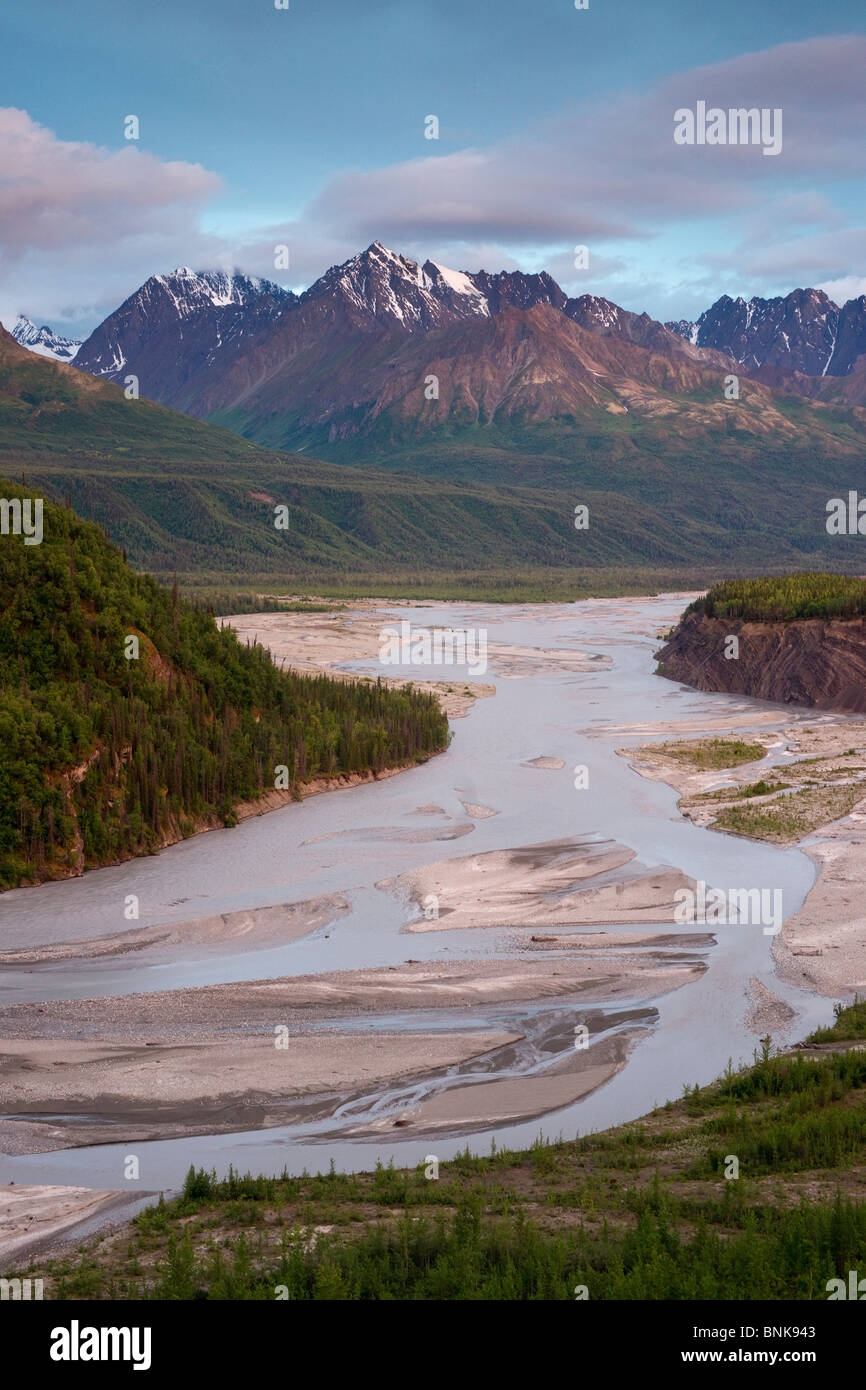 The Matanuska River runs through Alaska with The Chugach Mountains as a ...