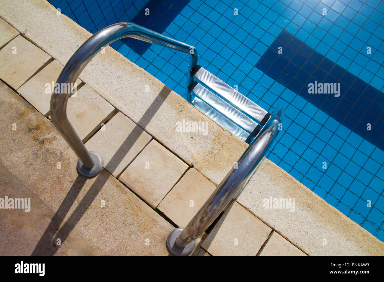 Steps into a swimming pool Stock Photo - Alamy