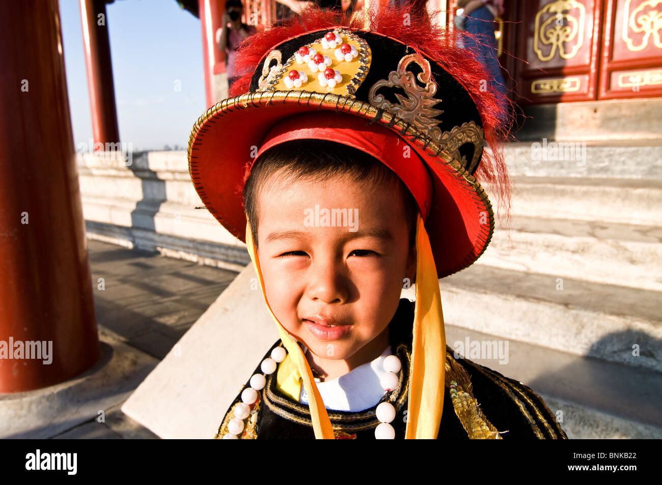 A cute Chinese boy dressed as an emperor Stock Photo - Alamy