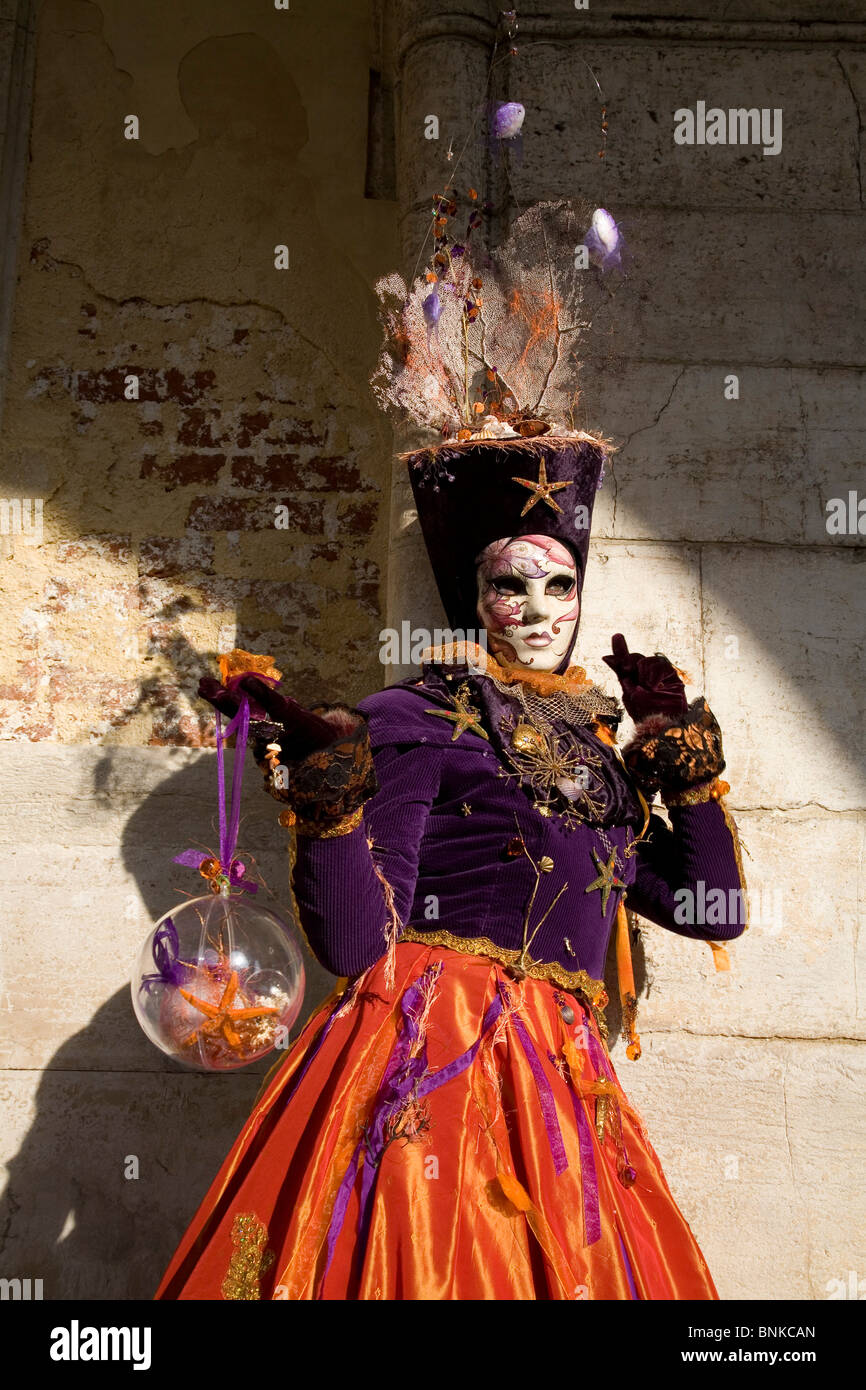 Disguised person during Venice carnival Stock Photo - Alamy