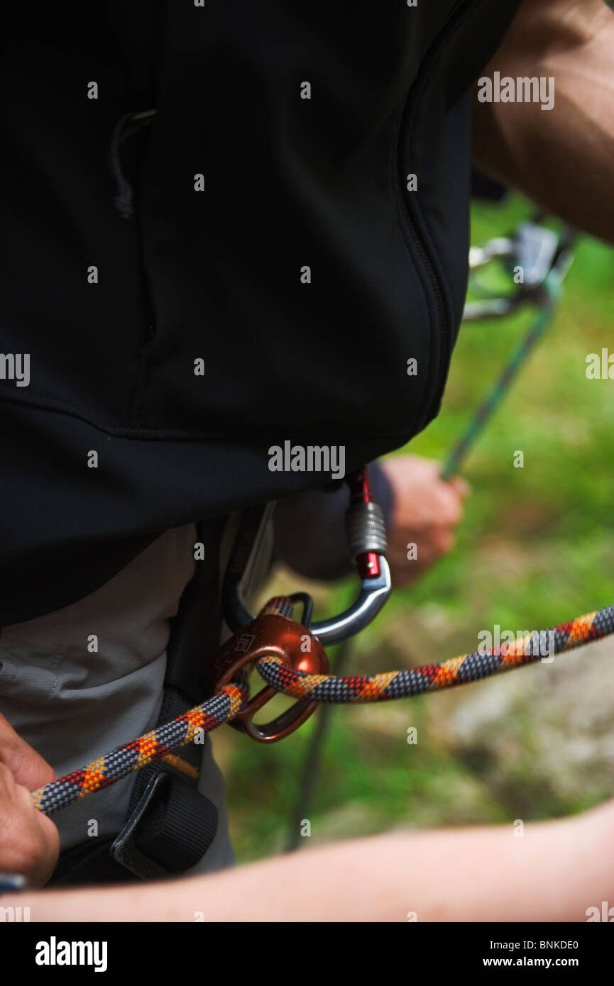 Abseiling down a cliff Stock Photo - Alamy