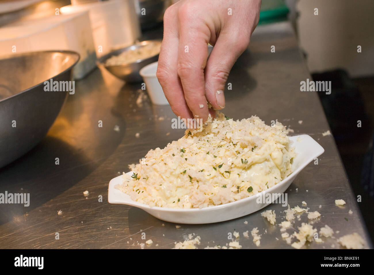A bowl of piping hot cauliflower cheese Stock Photo - Alamy