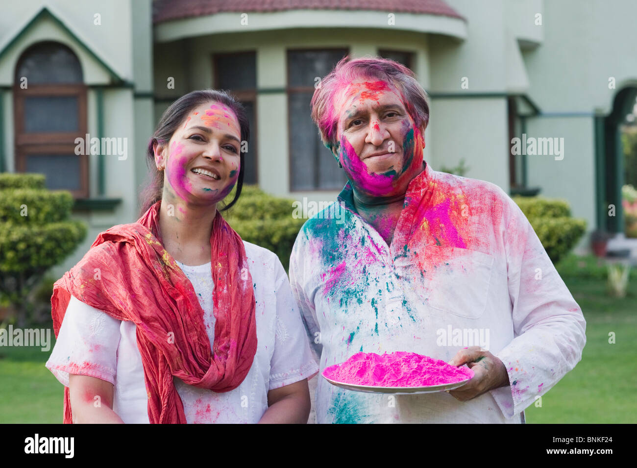 Couple celebrating Holi Stock Photo - Alamy