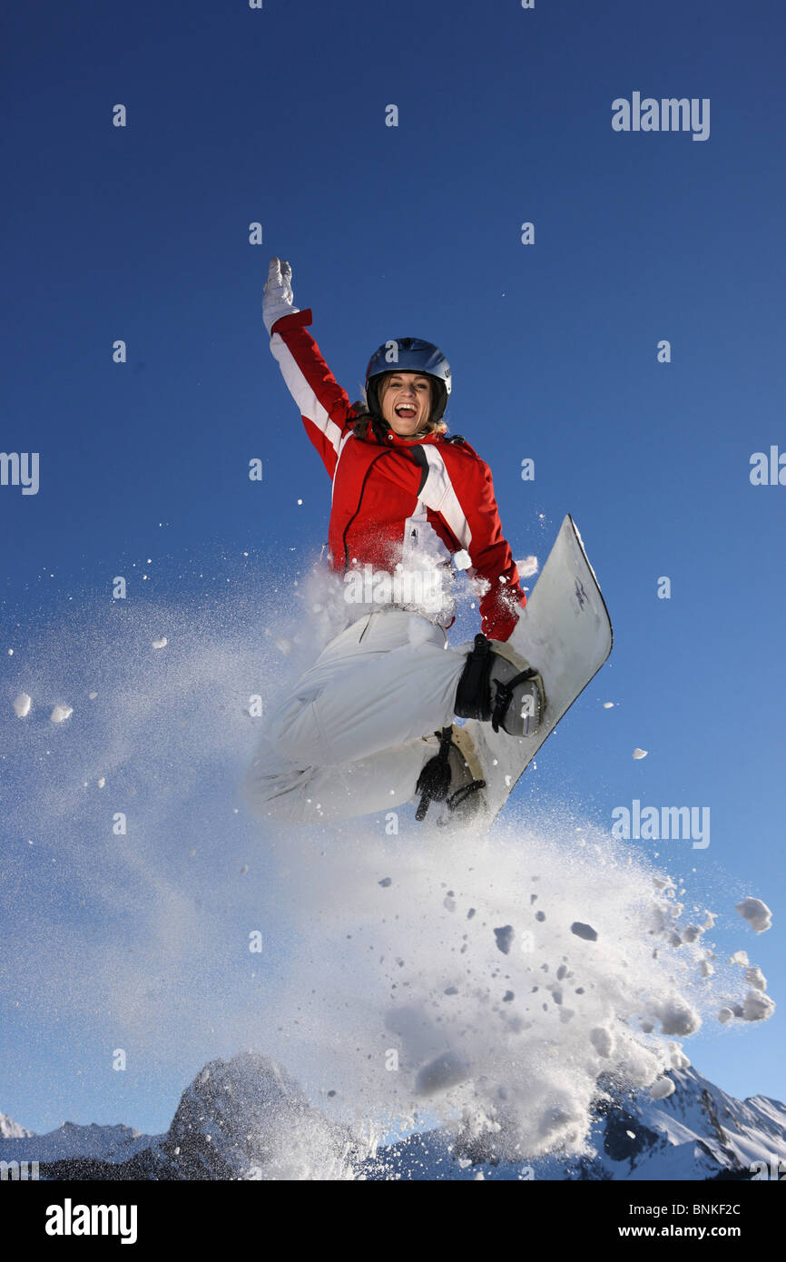 Girl Snowboarding Jump