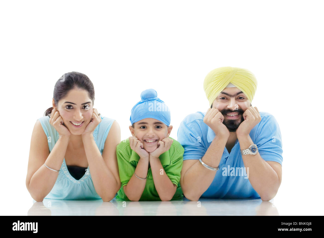 Sikh family posing Stock Photo - Alamy