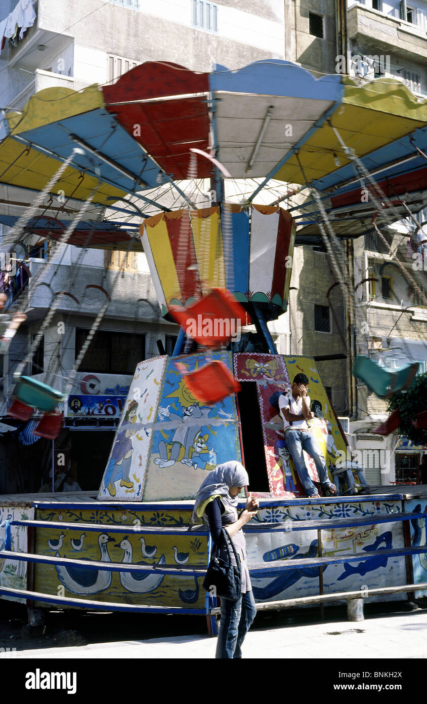 Chair-O-Planes at a funfair on Midan Maseged (Mosque Square) in central ...