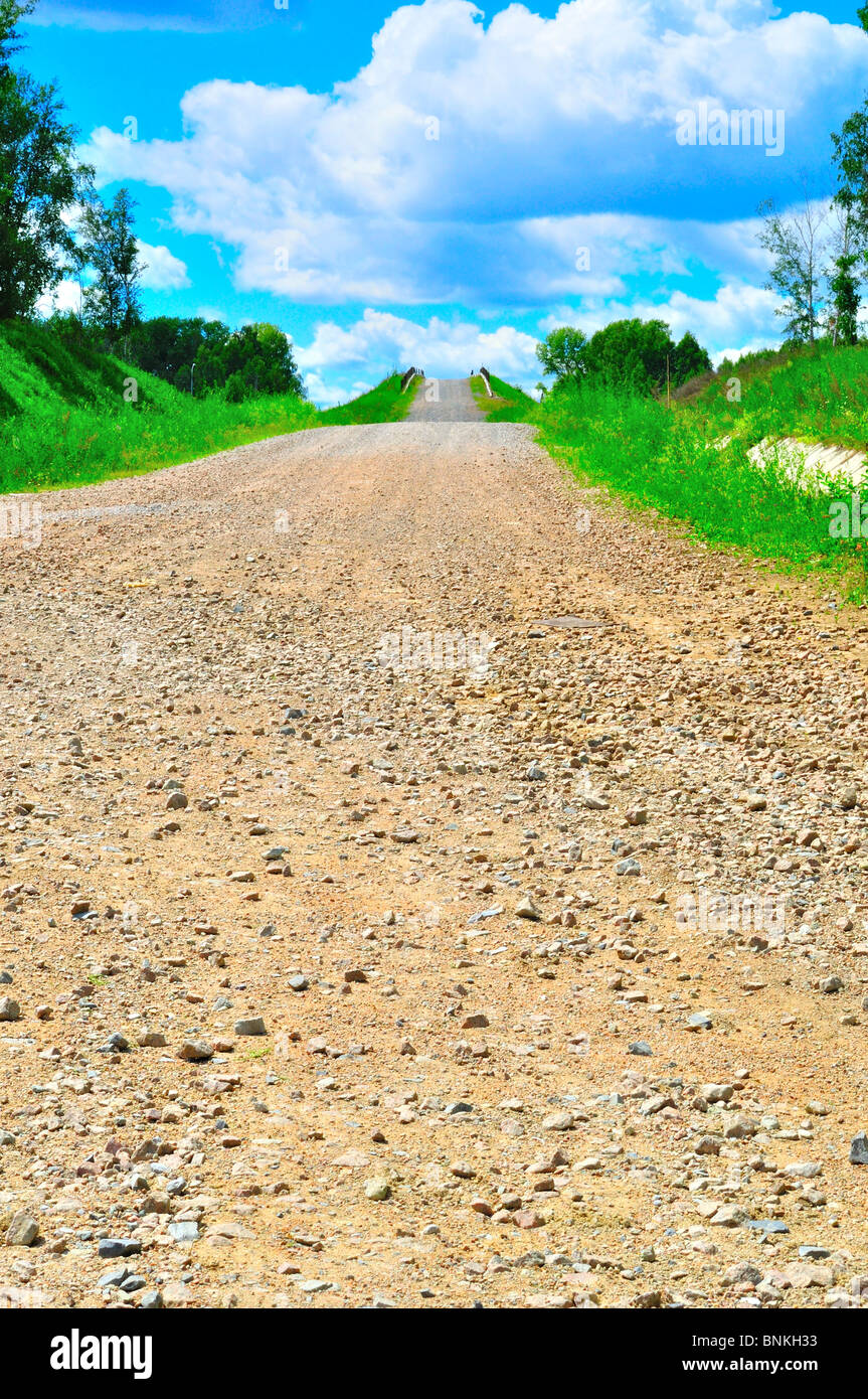 Ground road, grass road, bridge distant Stock Photo - Alamy