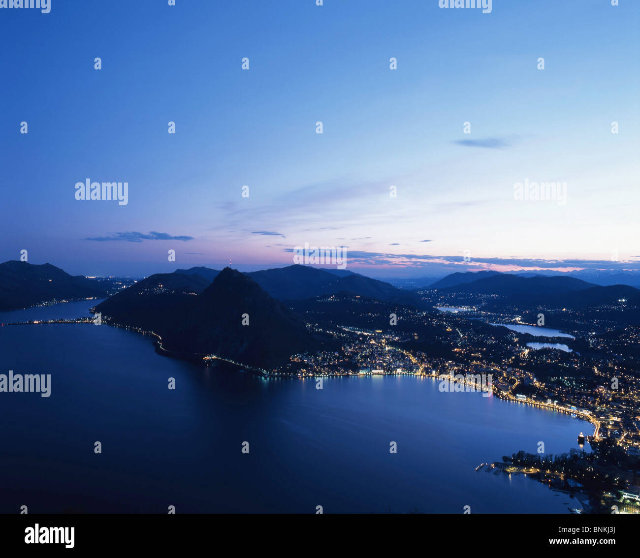 Switzerland Lugano at night aerial photo from above canton Ticino shore ...
