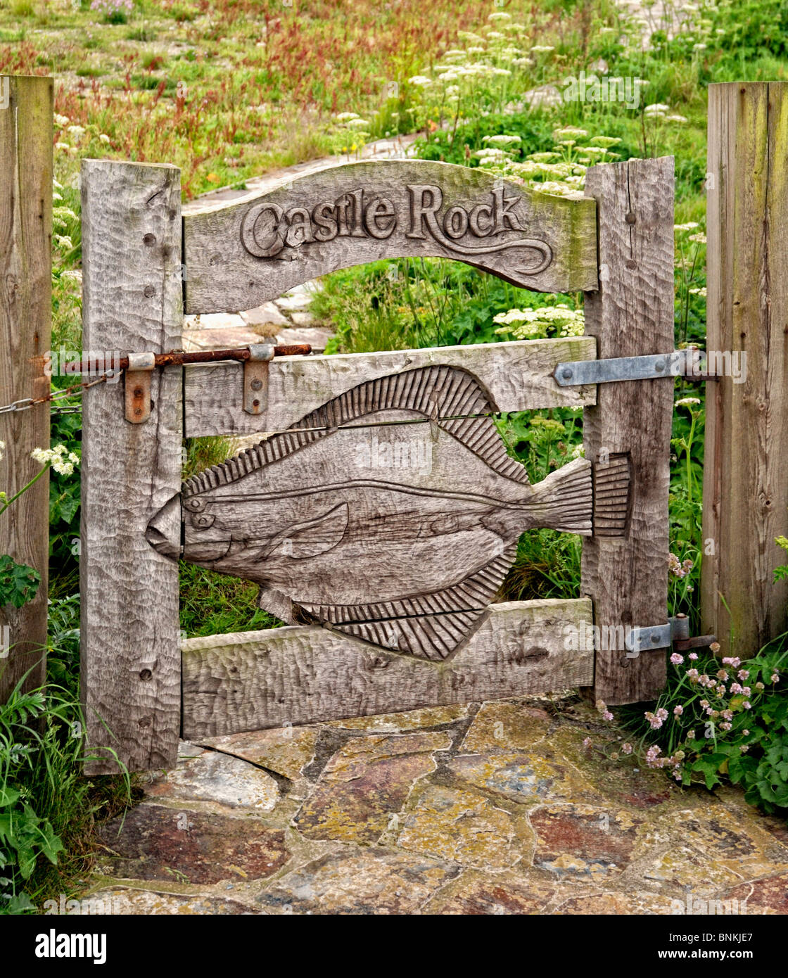 Carved gate in port Isaac Cornwall England uk Stock Photo - Alamy