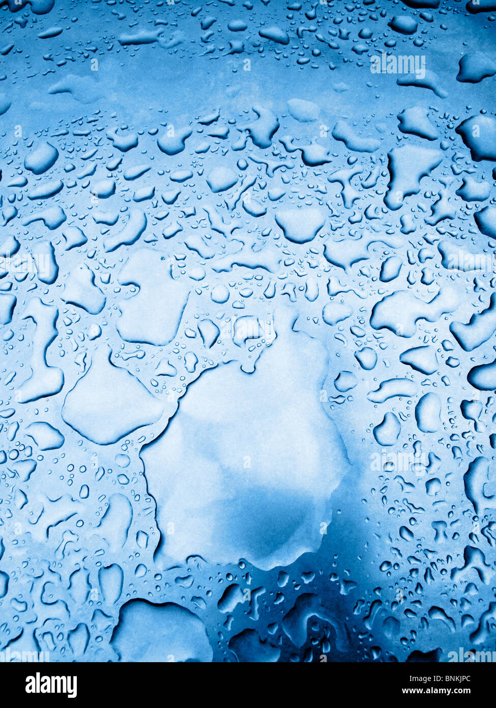 Water droplets seen from above on flat surface Stock Photo - Alamy