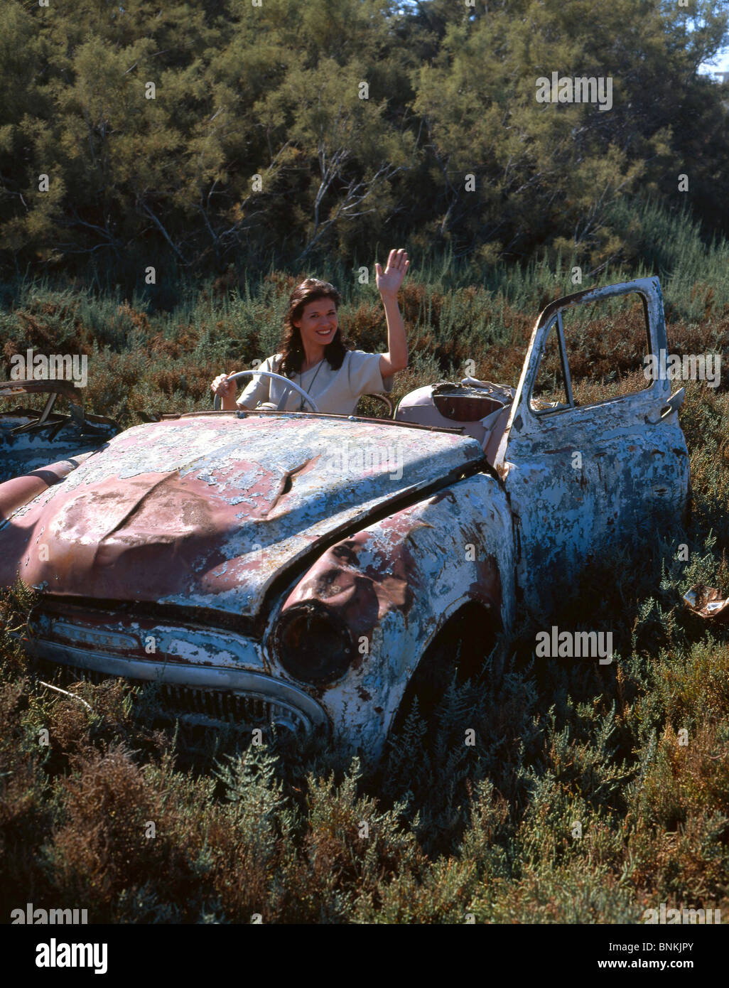 Woman scrap metal car rubbish waste portrait waving person waste ...